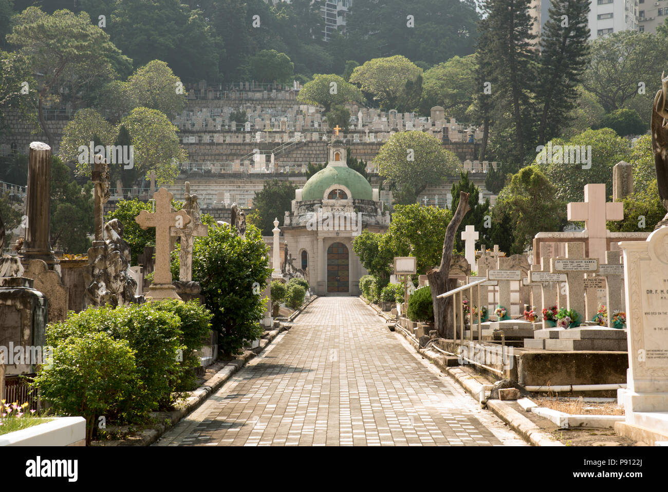 Cemetery in Hong Kong downtown on sunny day Stock Photo - Alamy