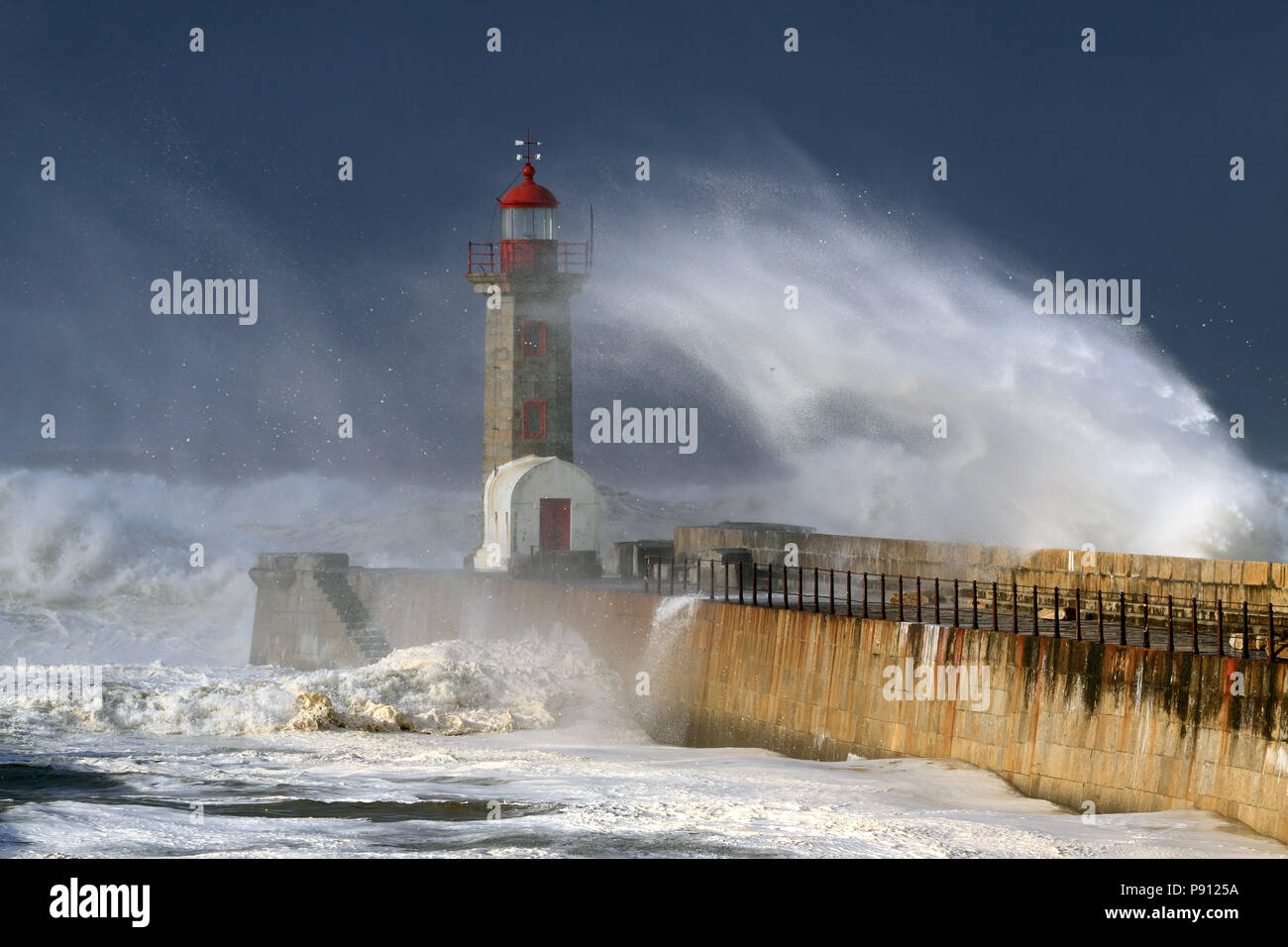 Lighthouse under heavy storm but with beautiful daylight Stock Photo ...