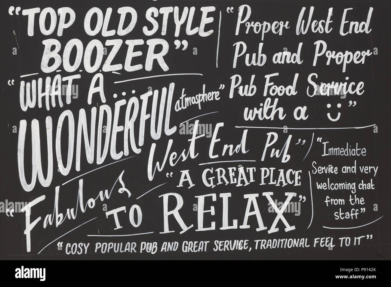 traditional British west end pub, blackboard sign Stock Photo - Alamy