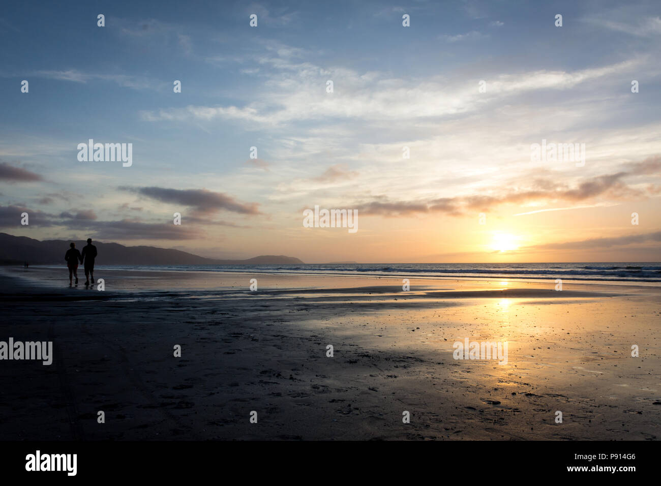 Two people walking hi-res stock photography and images - Alamy