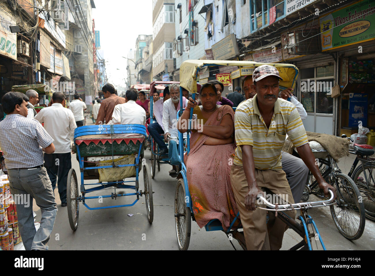 Street scenes from a moving tricycle ride through the busy streets of ...