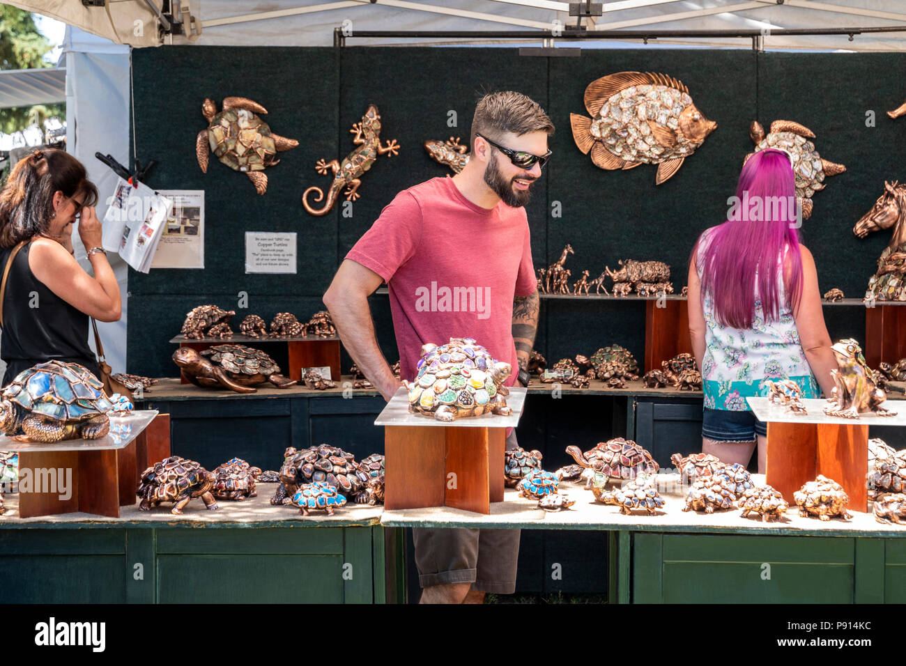 Patrons visit artist booths during annual small town art fair; Salida ...