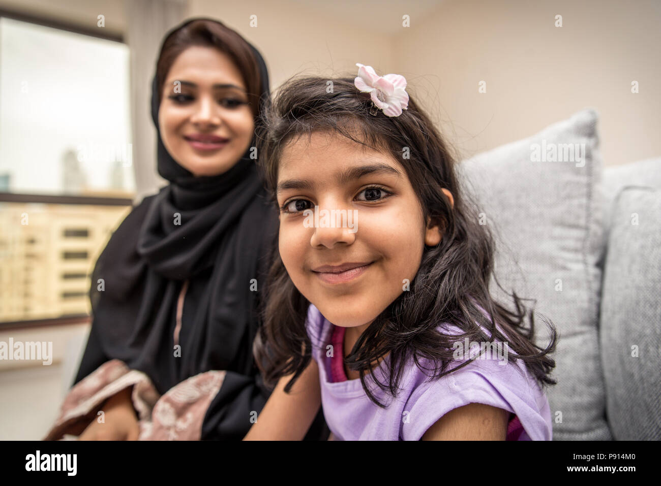 Happy arabian family having fun at home Stock Photo - Alamy