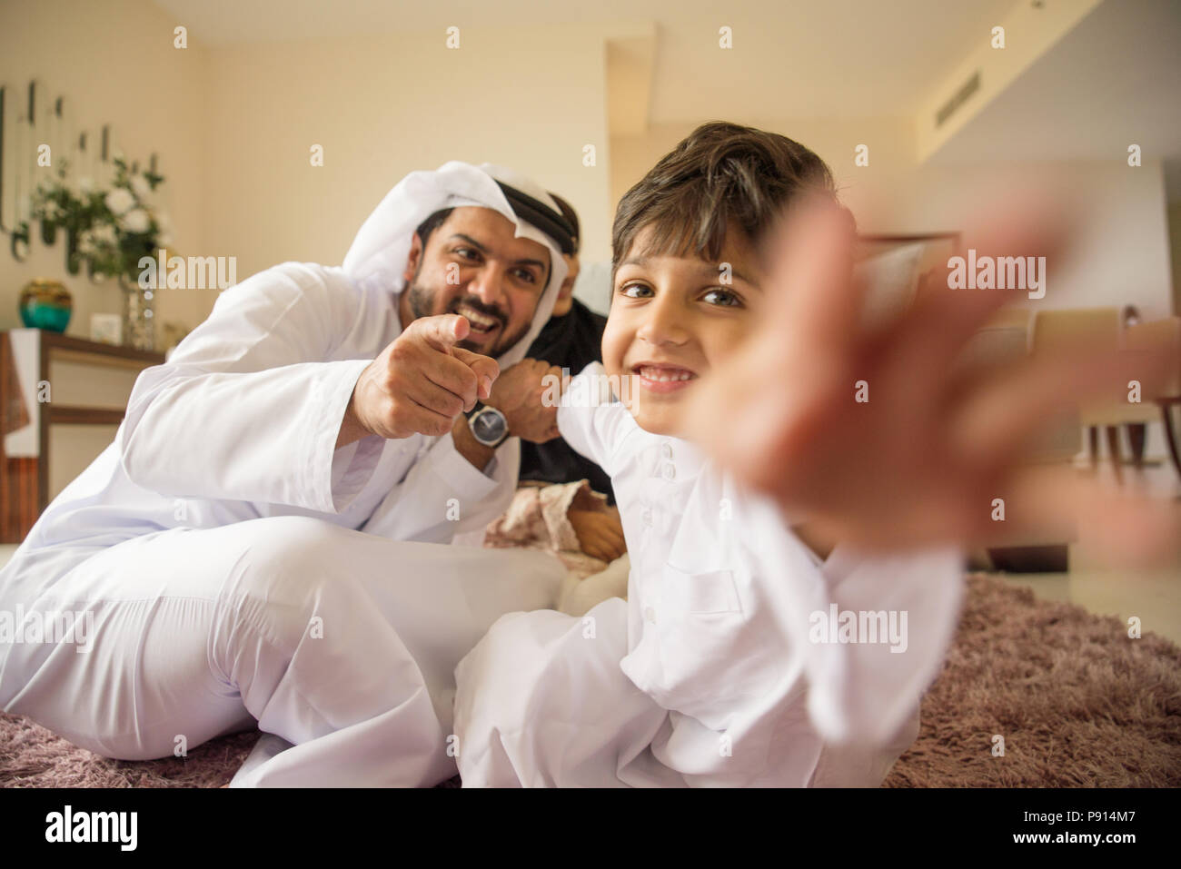 Happy arabian family having fun at home Stock Photo - Alamy
