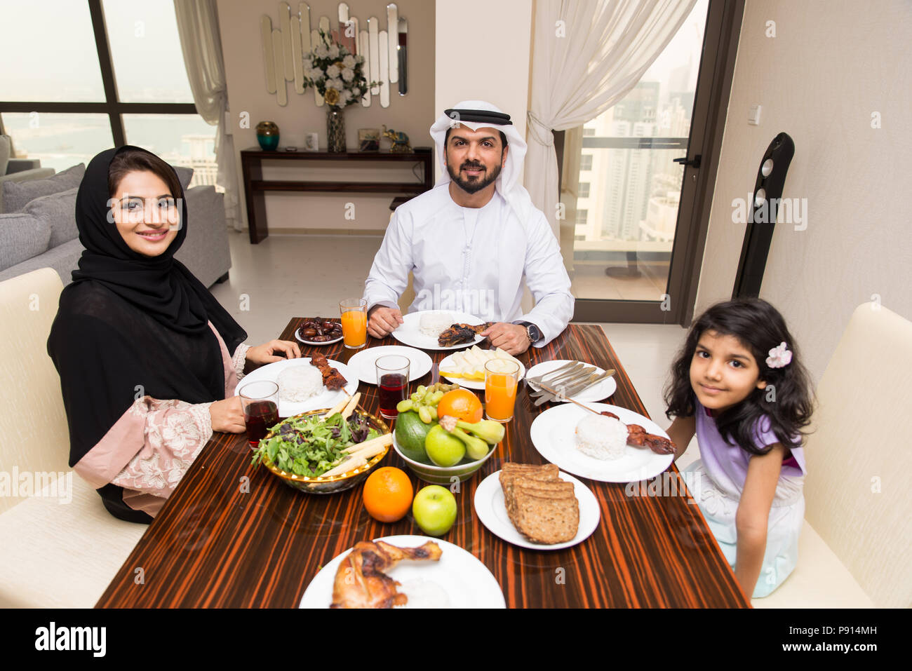 Happy arabian family having fun at home Stock Photo - Alamy