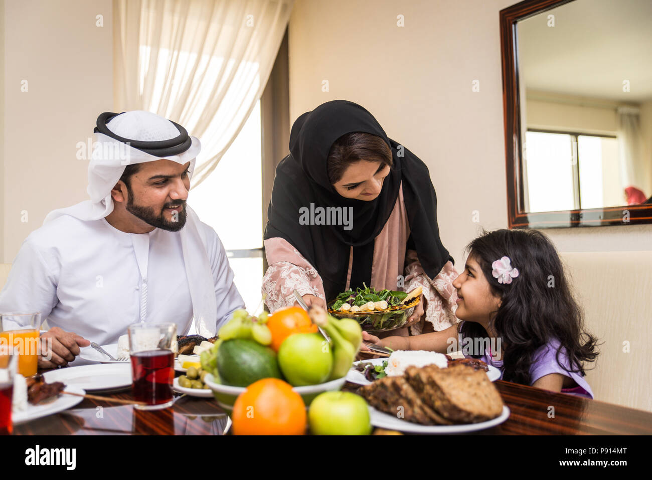 Happy arabian family having fun at home Stock Photo - Alamy