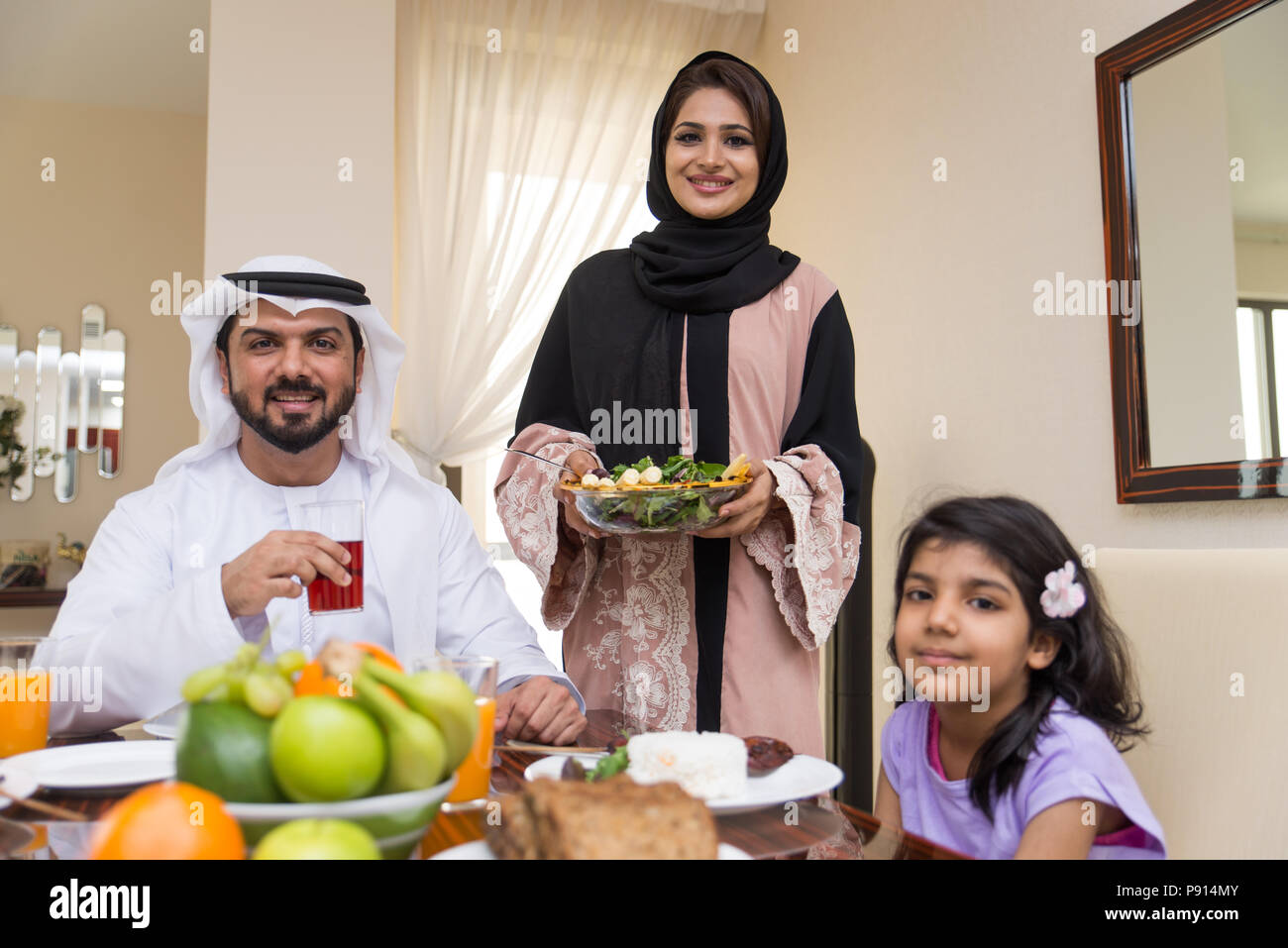 Happy arabian family having fun at home Stock Photo - Alamy