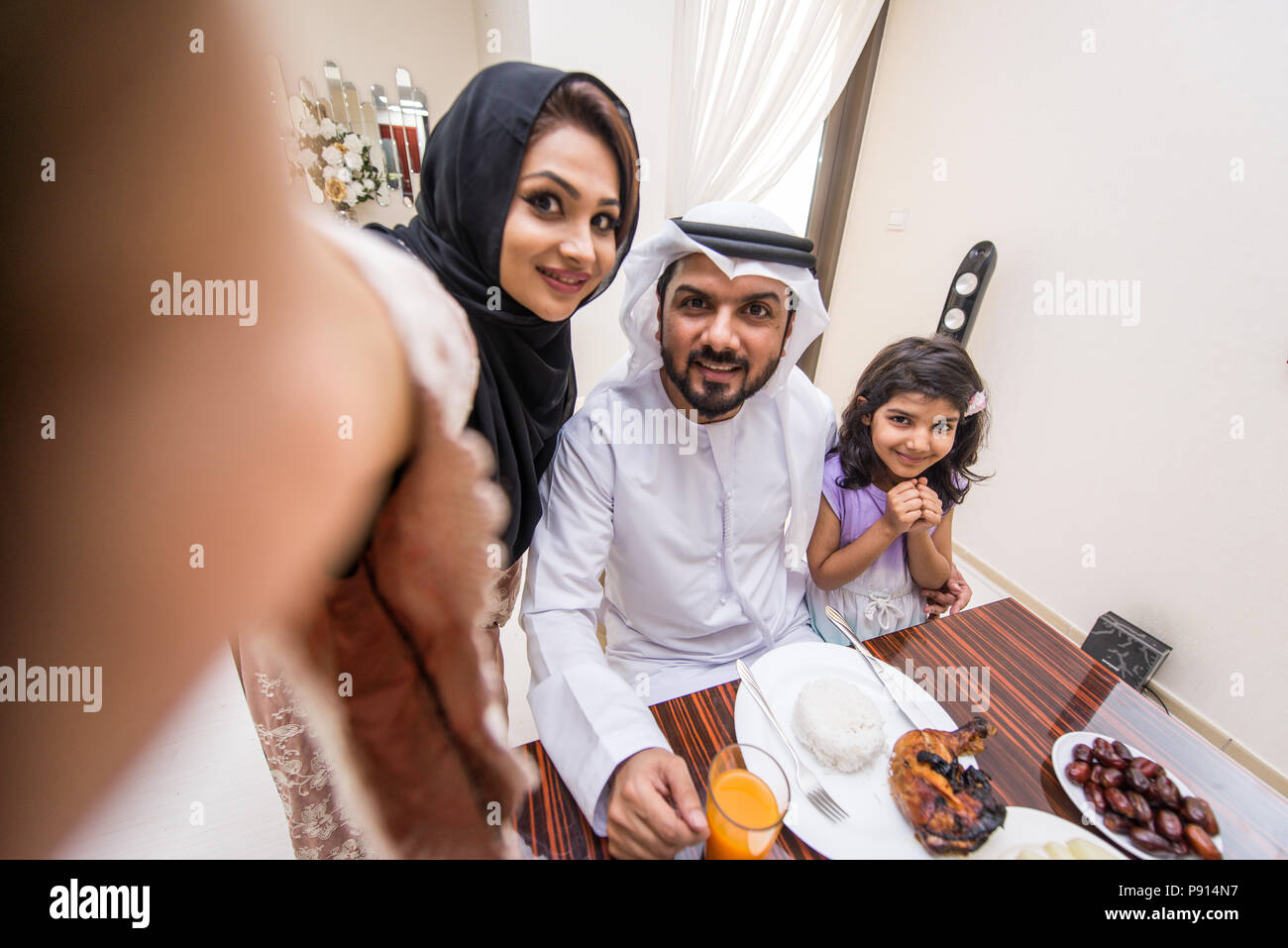 Happy arabian family having fun at home Stock Photo - Alamy