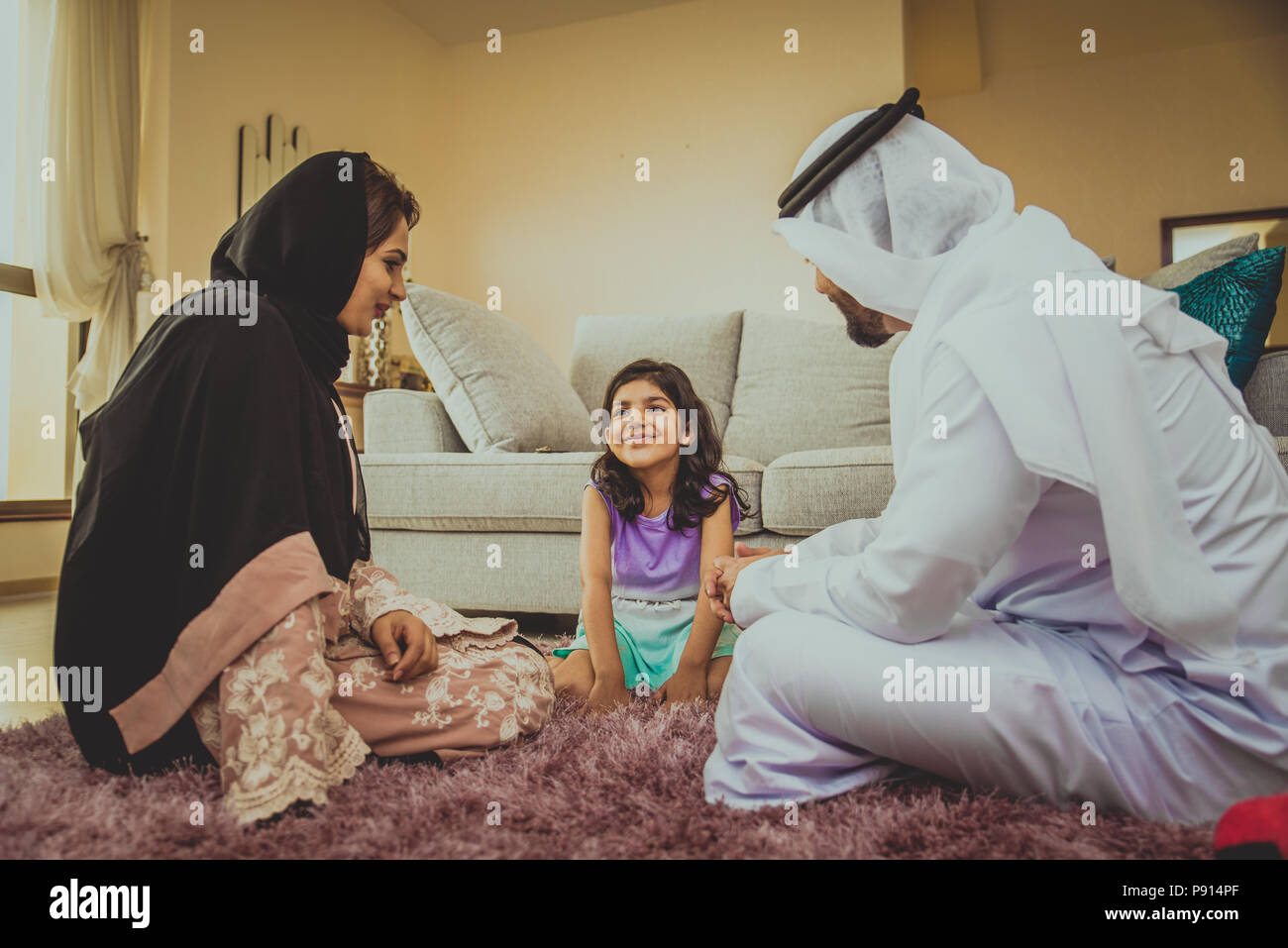 Happy arabian family having fun at home Stock Photo - Alamy