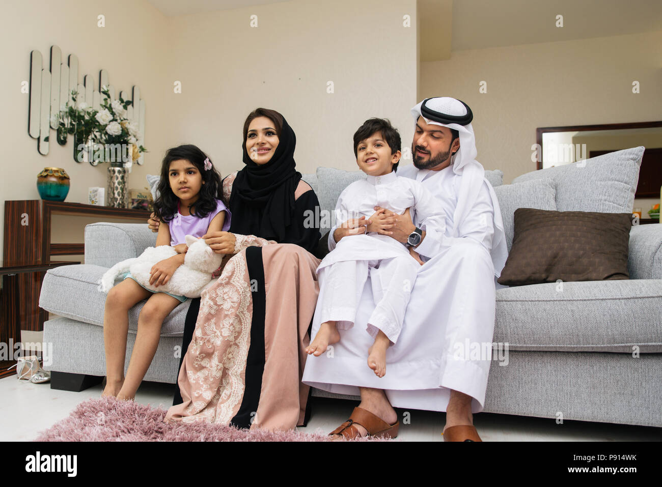 Happy arabian family having fun at home Stock Photo - Alamy