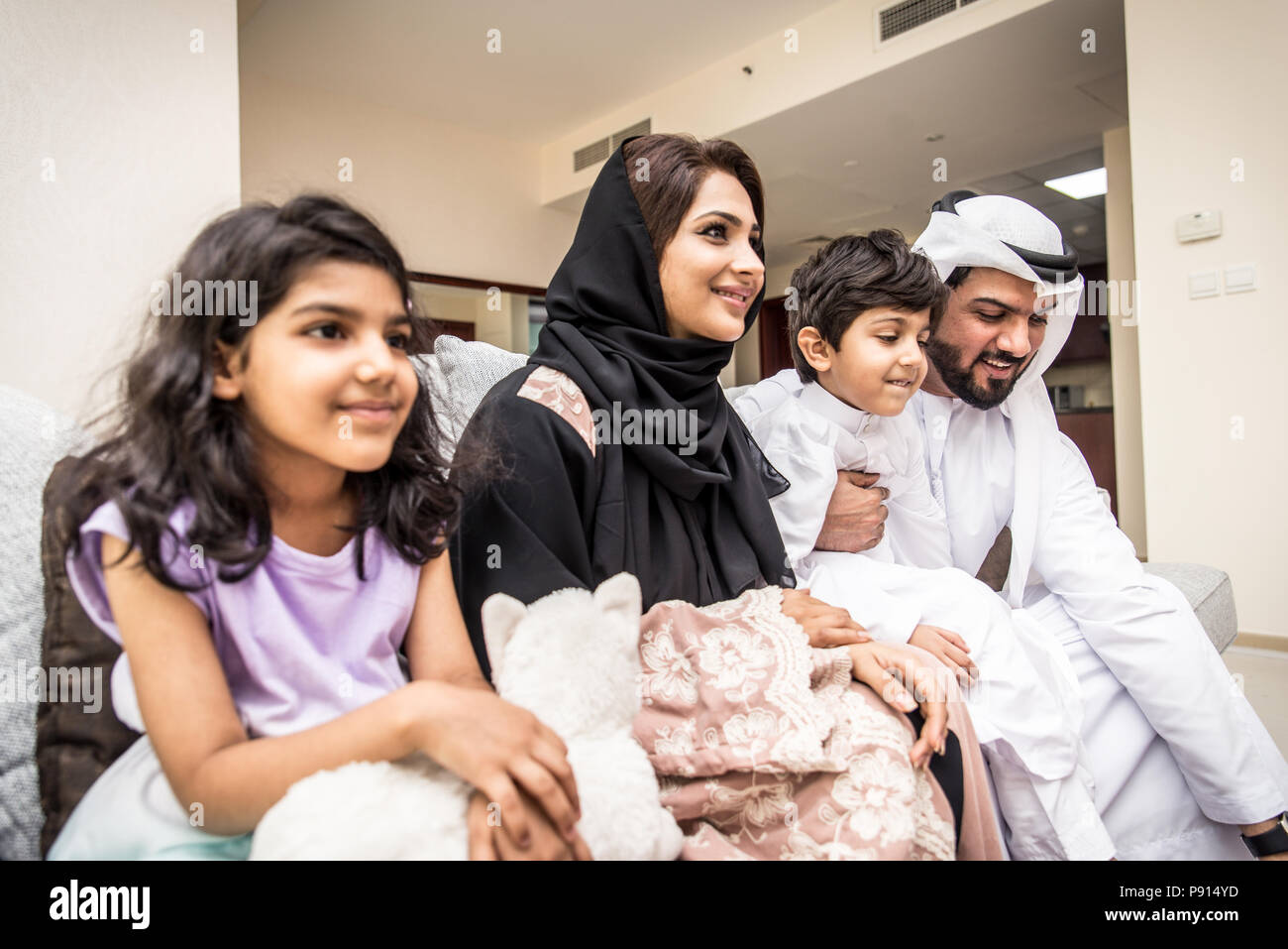 Happy arabian family having fun at home Stock Photo - Alamy