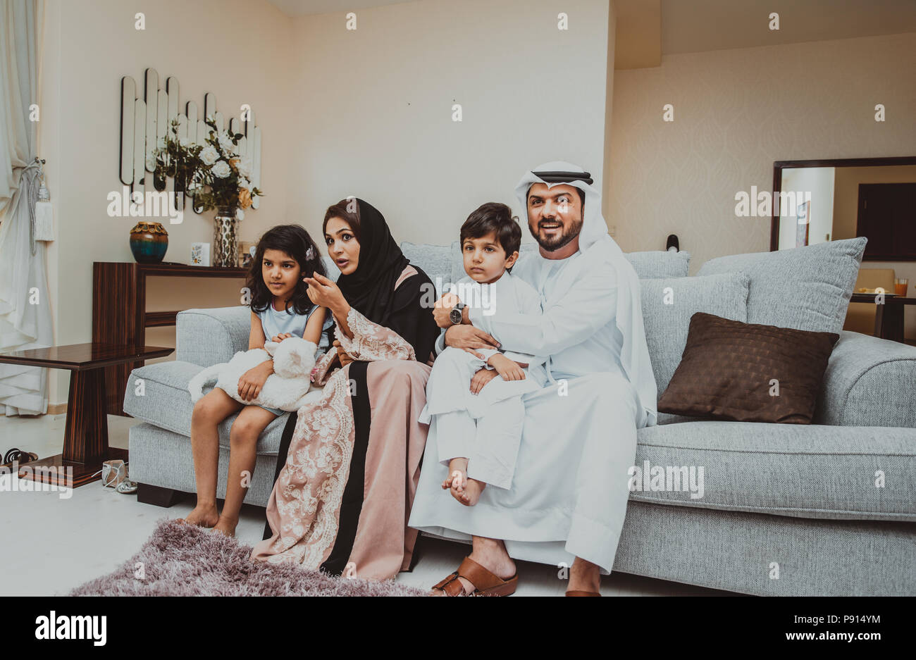 Happy arabian family having fun at home Stock Photo - Alamy