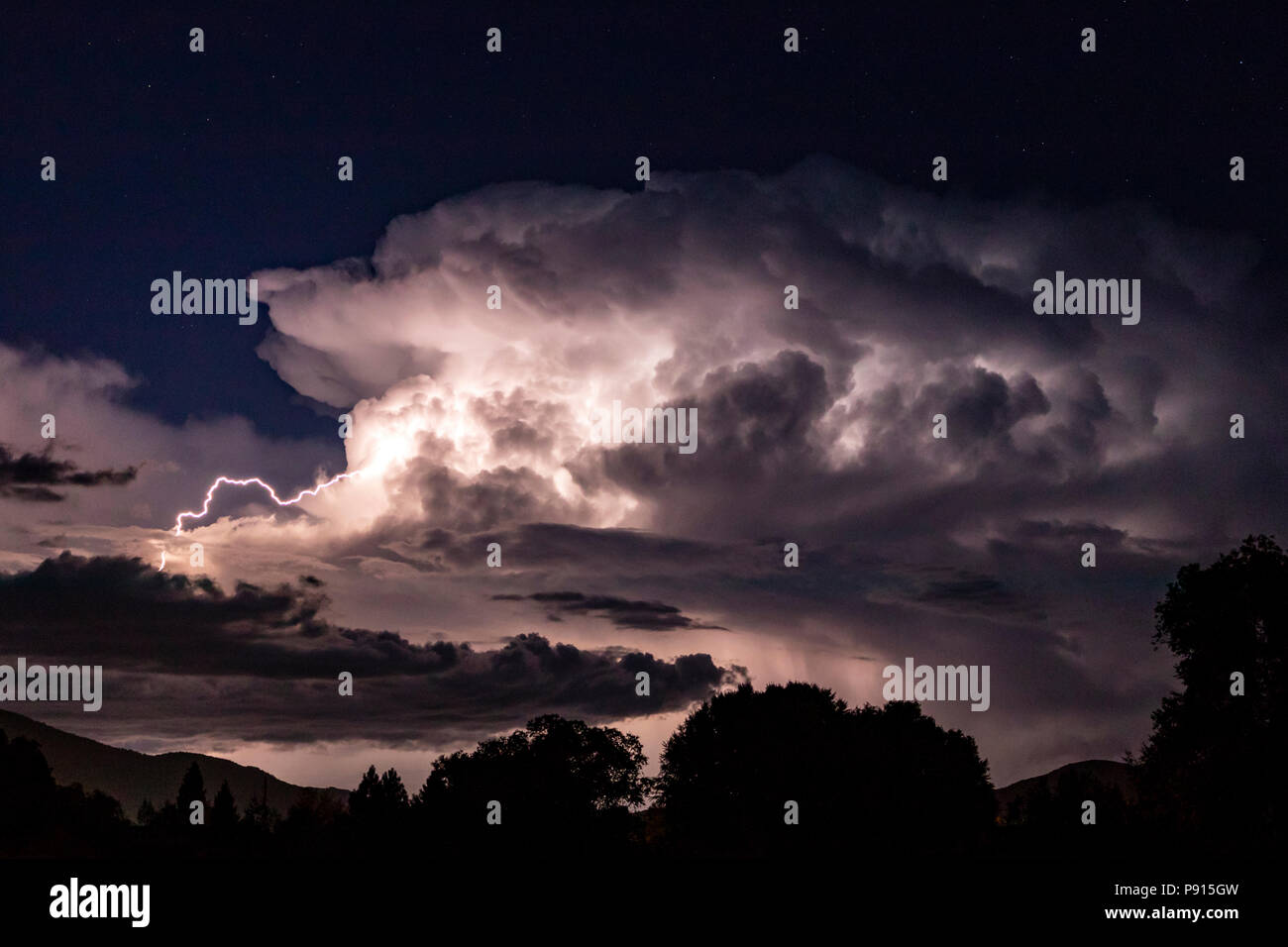 Dramatic lightning storm illuminates nighttime sky; Salida; Colorado ...