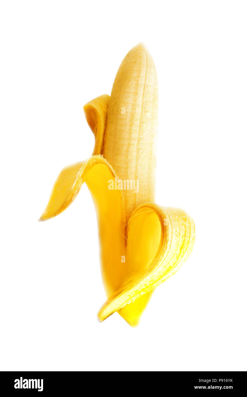 Photo of a close-up of a delicious ripe banana on a white background ...