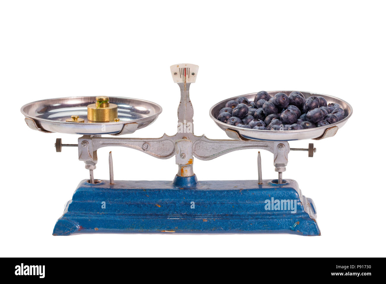blueberry on measure weight for scale Stock Photo - Alamy