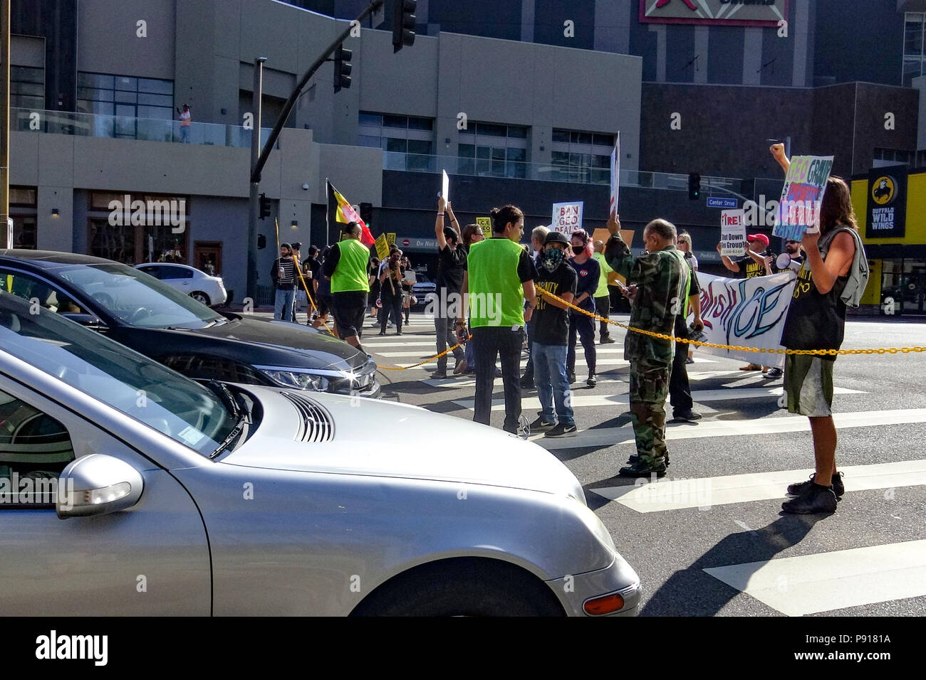 Los Angeles, USA. 13th July, 2018 - Protesters blocking road while ...