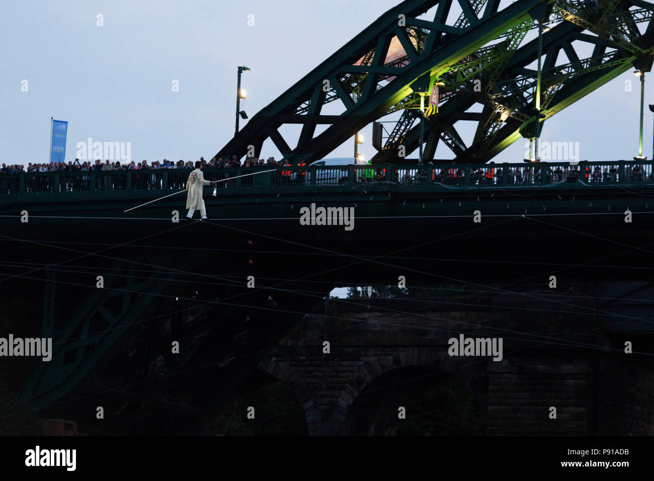 High wire balancing act hi-res stock photography and images - Alamy