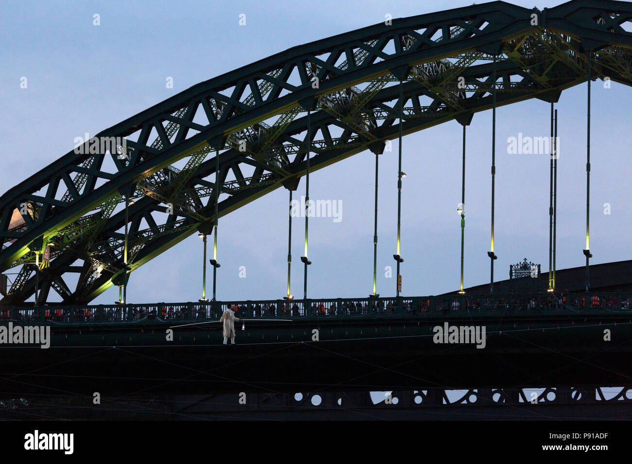 Members of Cirque Bijou perform a high wire act to Wearmouth Bridge in ...