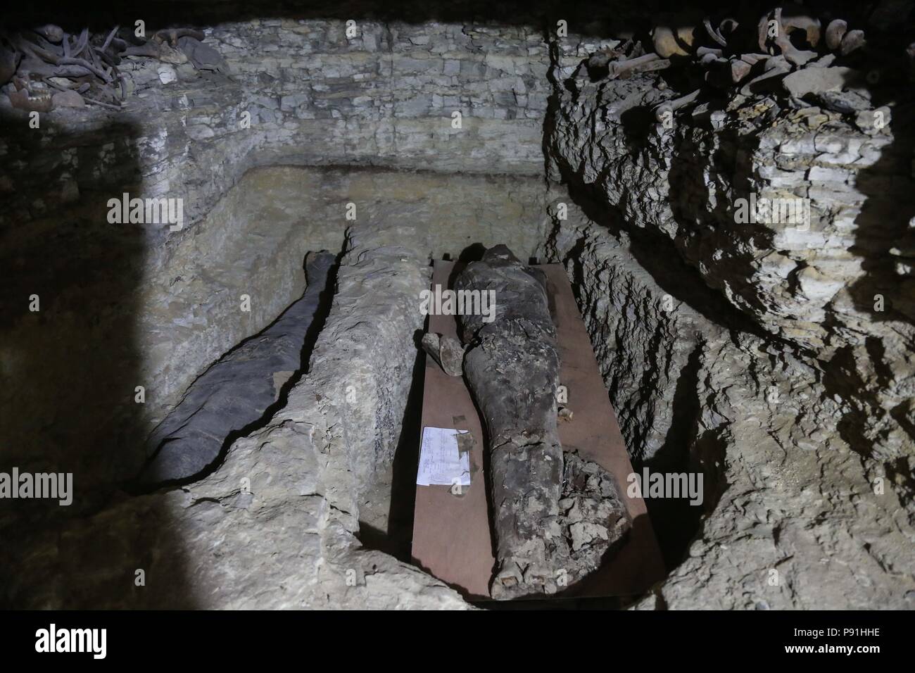 Giza, Egypt. 14th July, 2018. A general view of two mummies, inside a ...