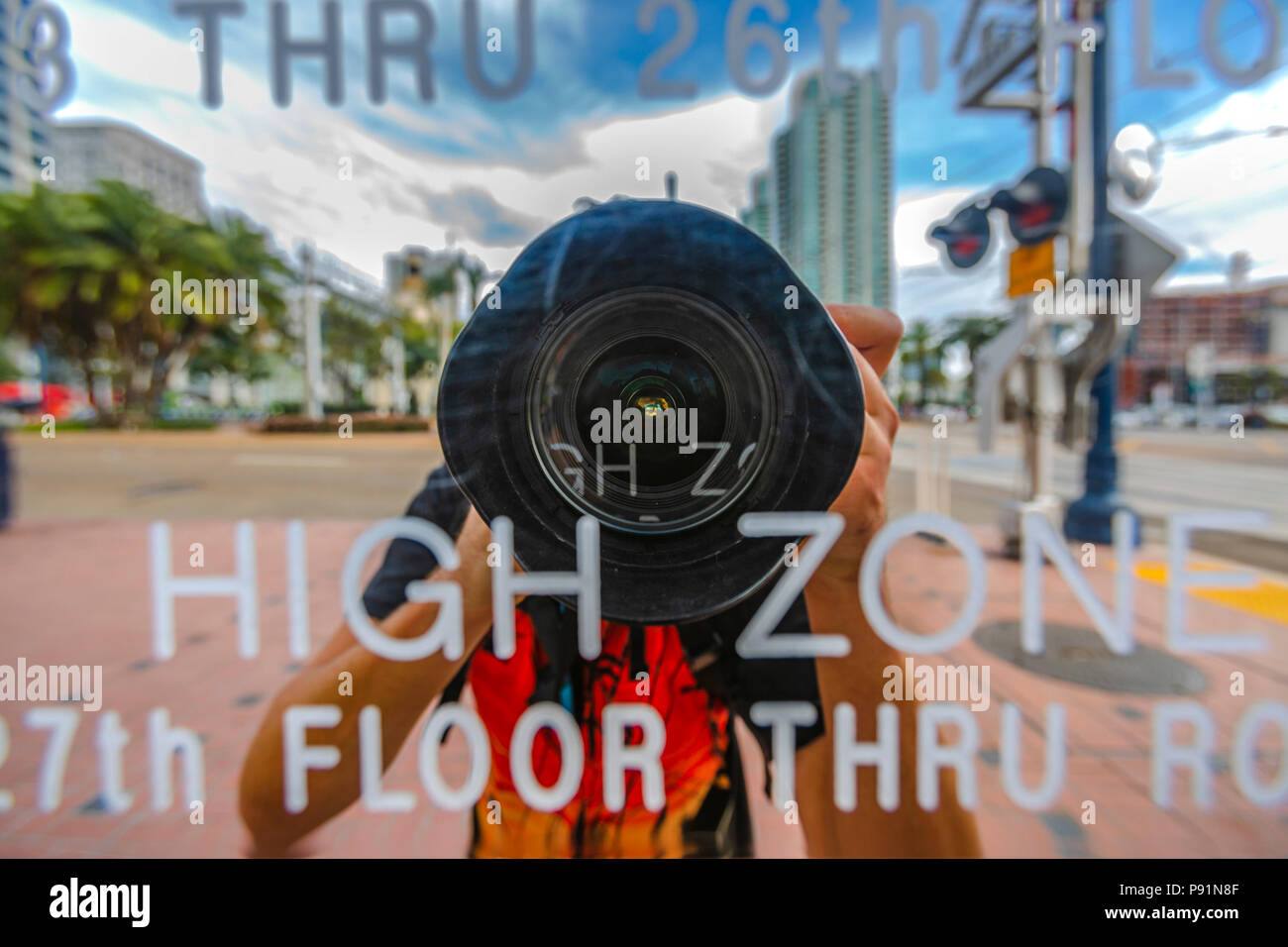 Camera points at utility sign Stock Photo - Alamy