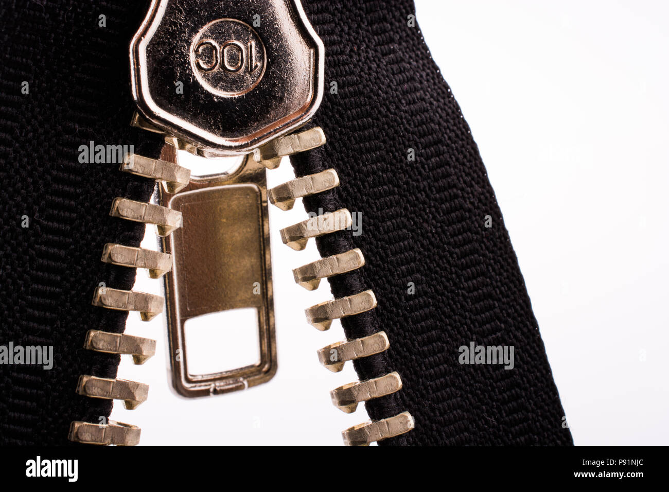 Color zipper on a white background Stock Photo - Alamy
