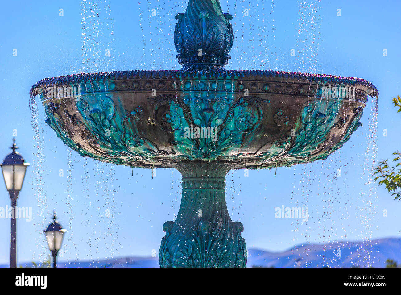 Lower basin of copper fountain Stock Photo - Alamy