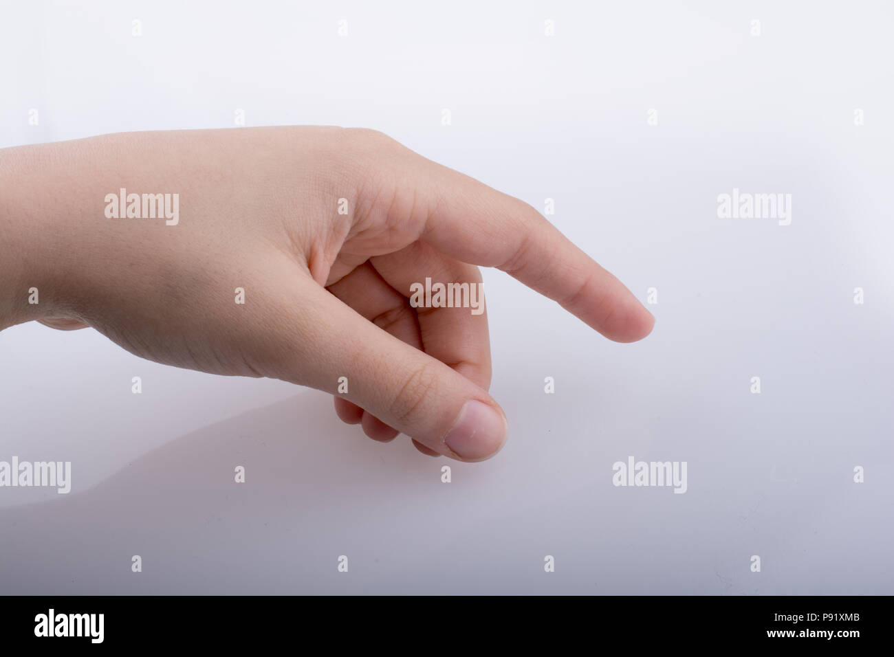 Hand pointing on a white background Stock Photo - Alamy