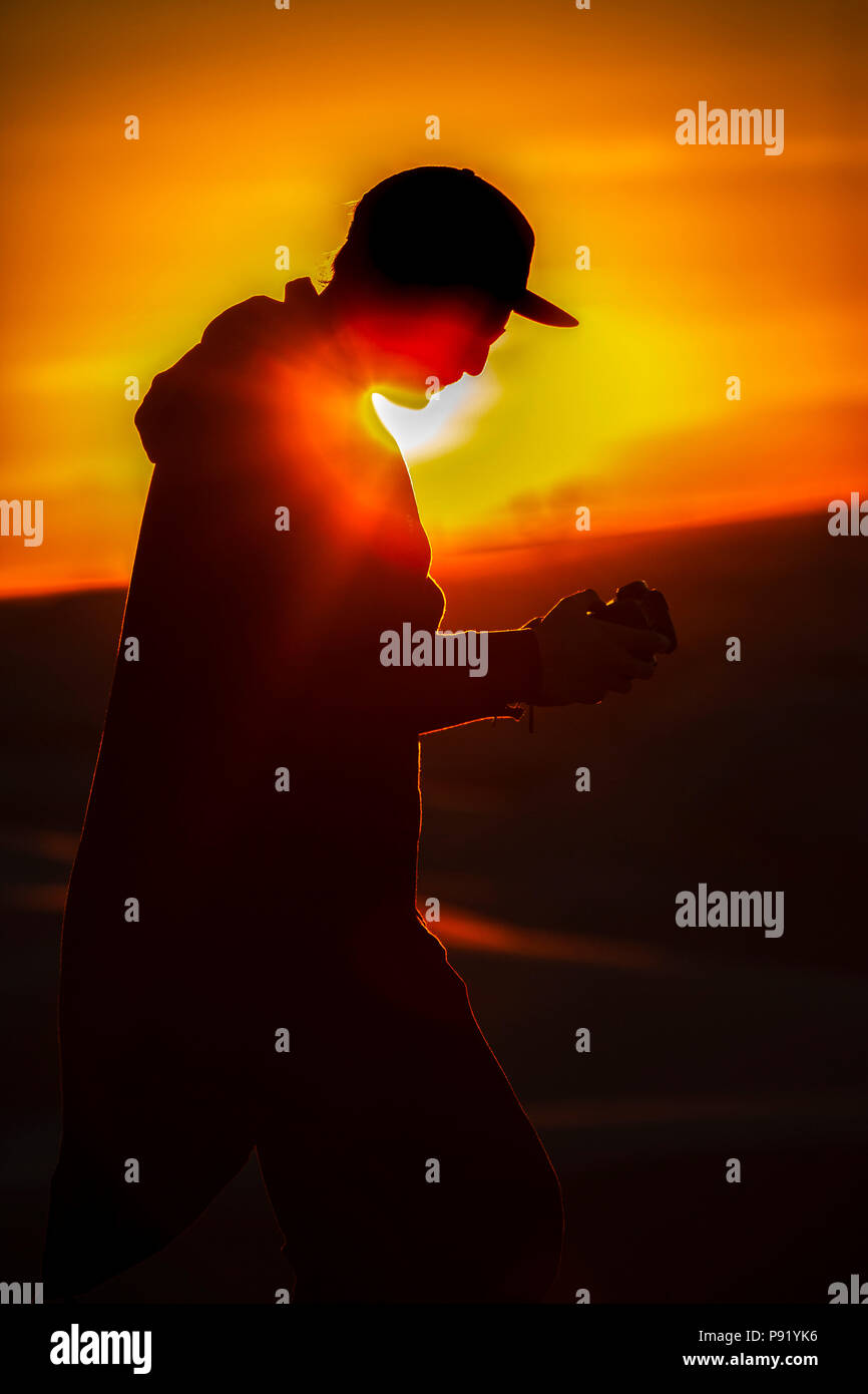 Man looks back camera hi-res stock photography and images - Alamy