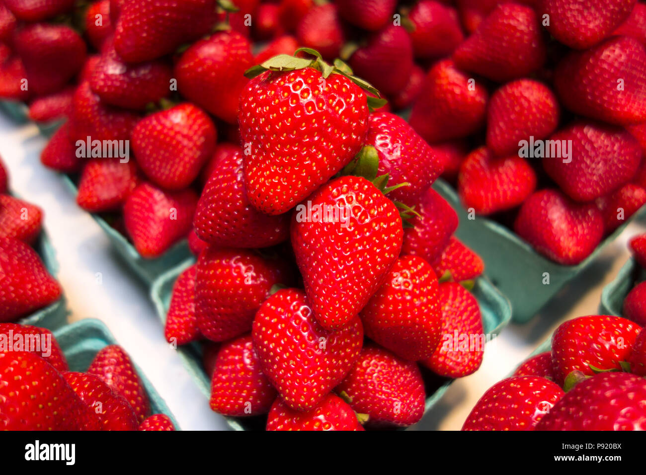 Fresh red strawberry fruits close up background Stock Photo - Alamy