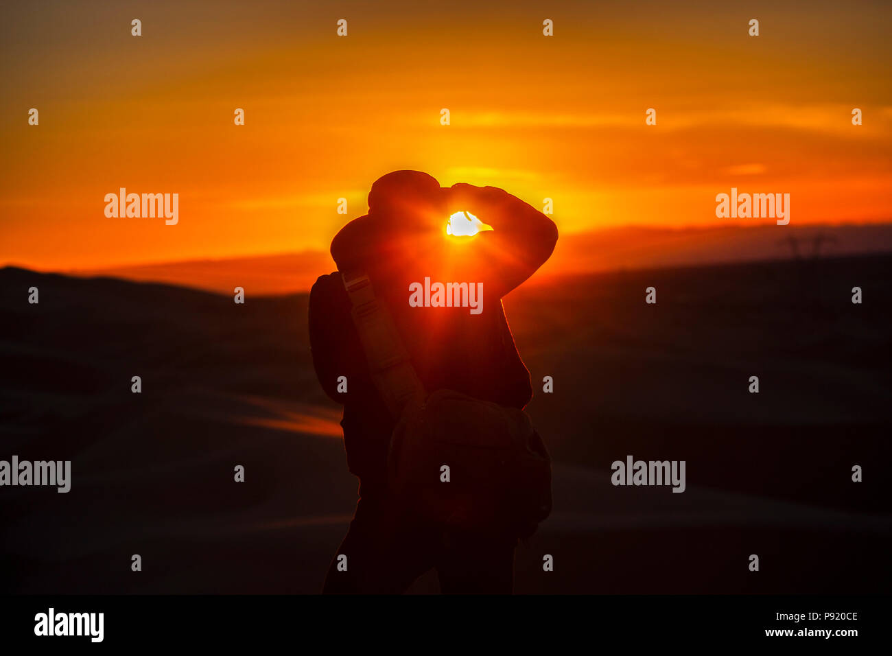 Person sunset in background hi-res stock photography and images - Alamy