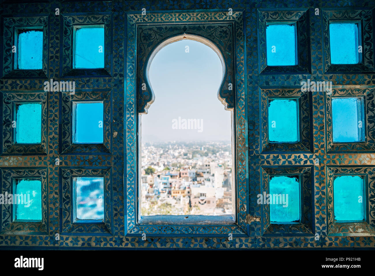 Indian style window and Udaipur city view from City Palace in India ...