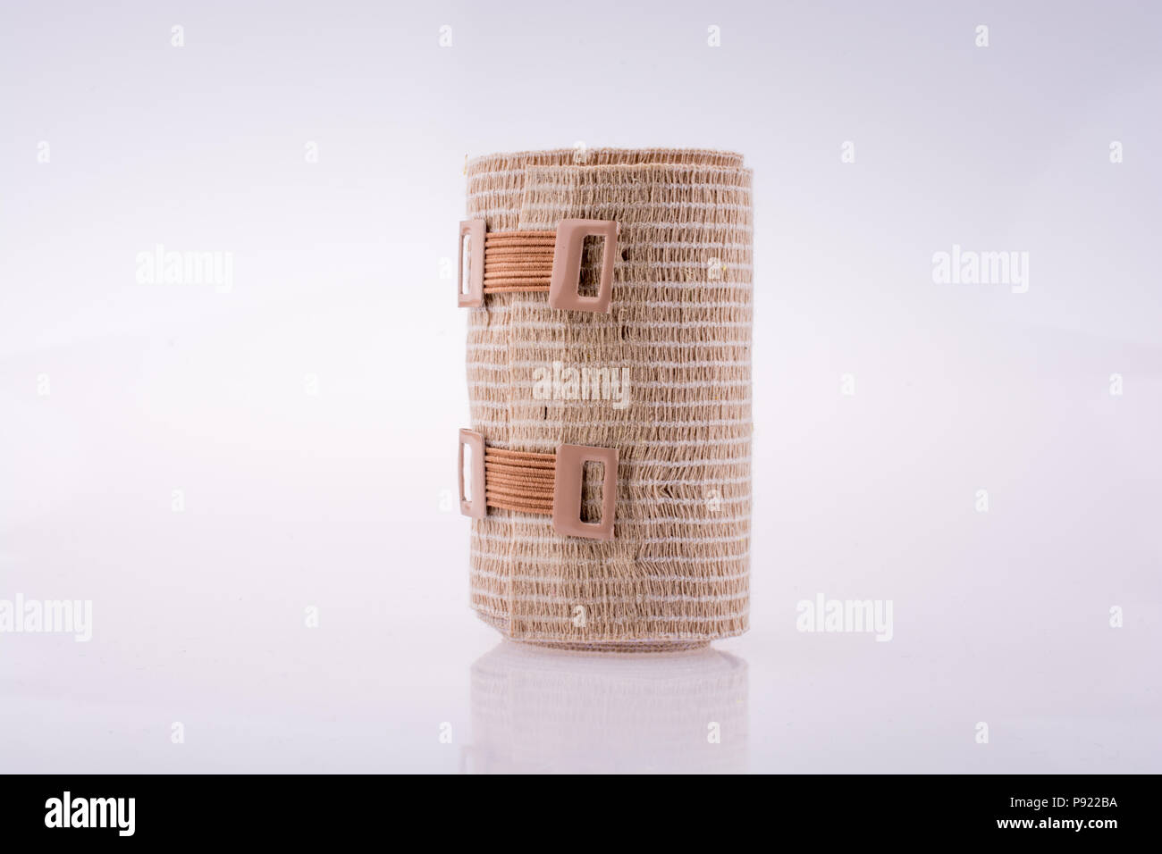 Rolled bandage on a white background Stock Photo - Alamy