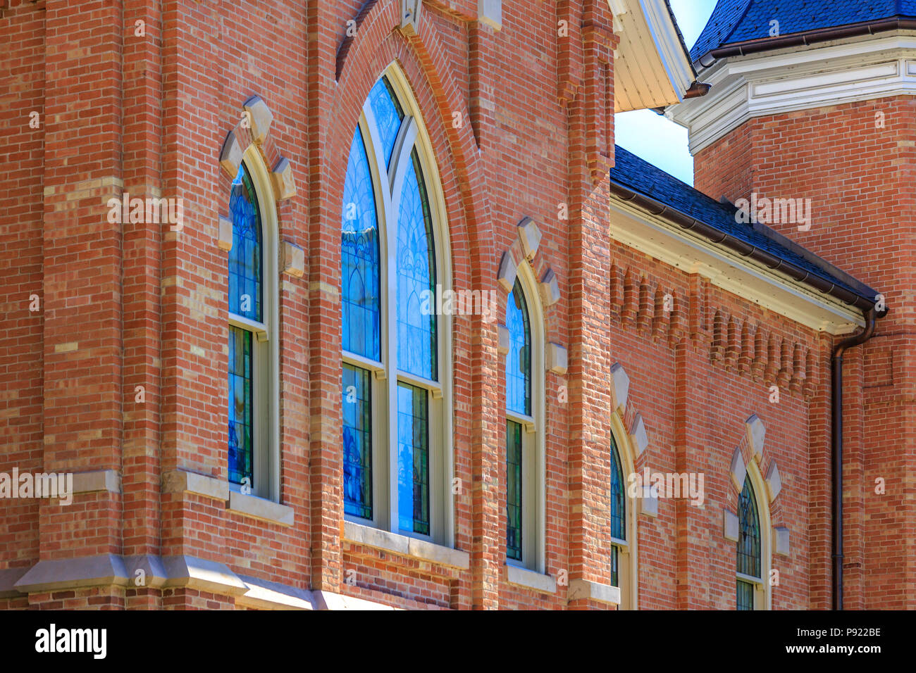 Red brick and decorative windows Stock Photo - Alamy