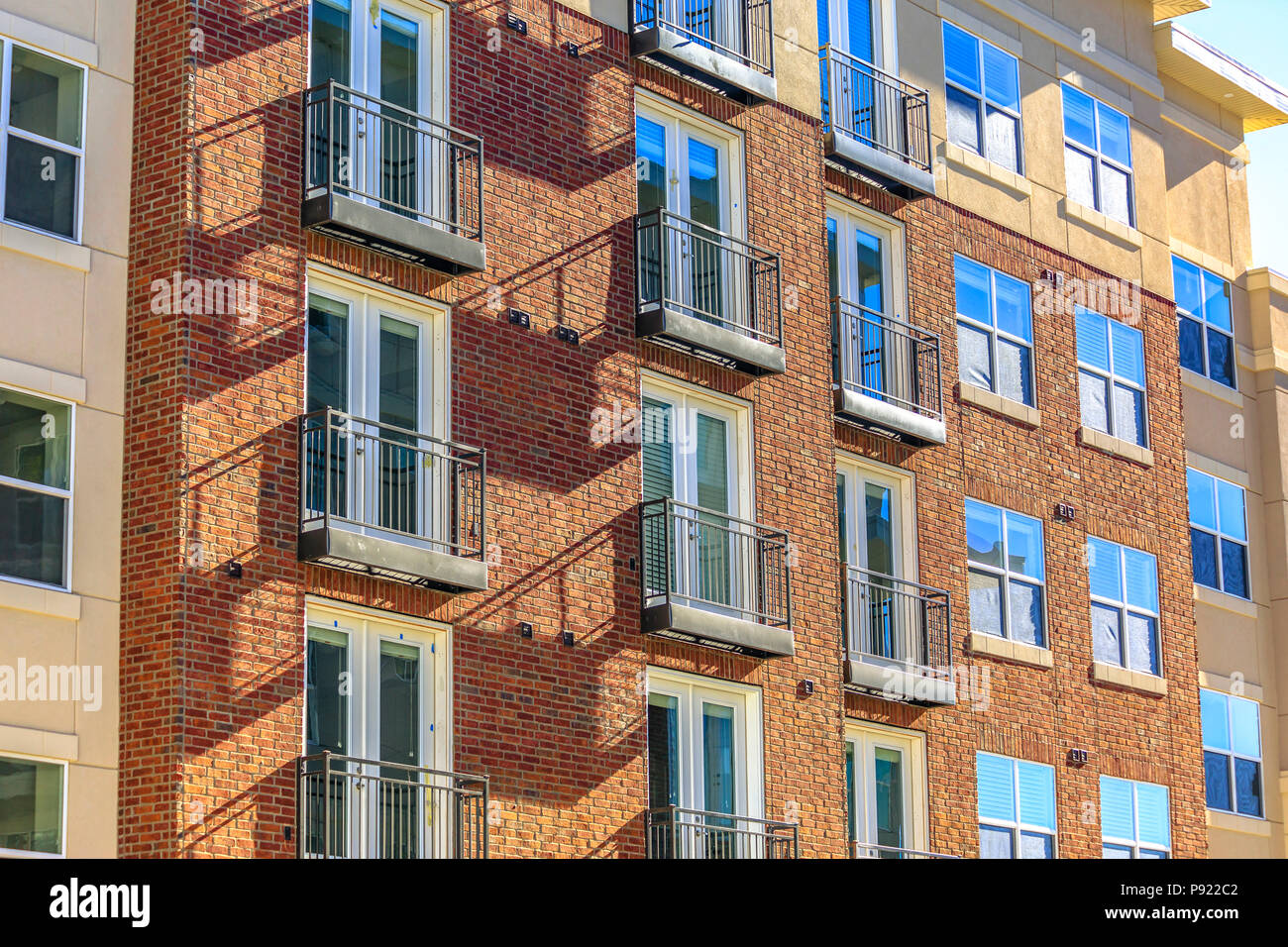 Red brick condo city hi-res stock photography and images - Alamy