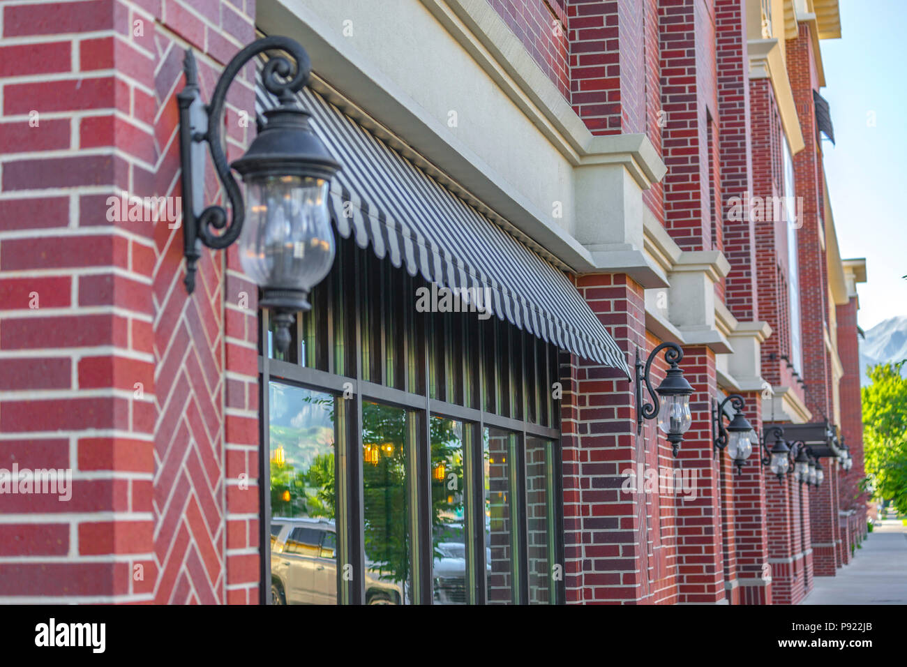Red brick on store fronts of Provo Stock Photo - Alamy