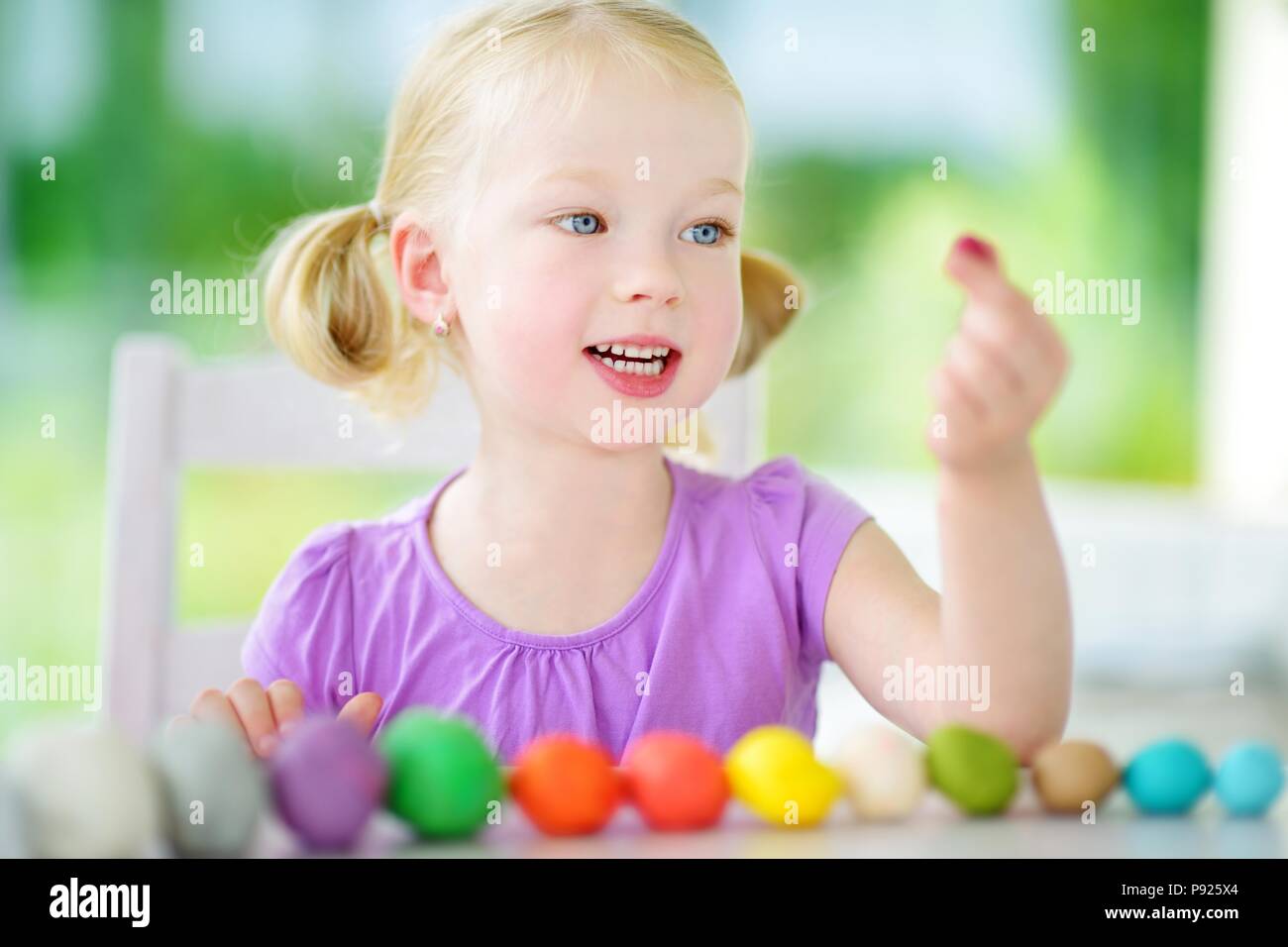 Child molding people clay hi-res stock photography and images - Alamy