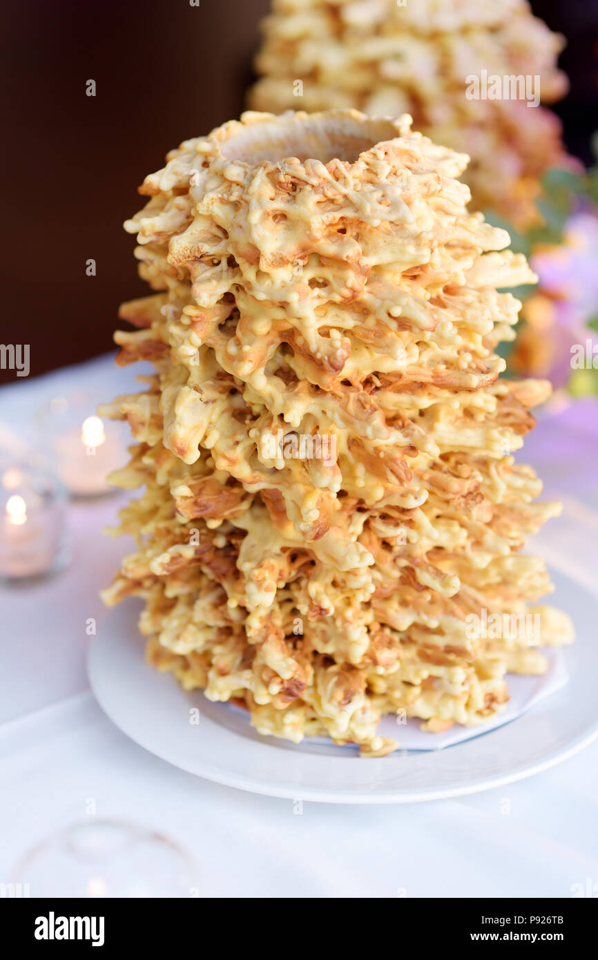 Traditional Lithuanian wedding cake called sakotis on a table Stock ...