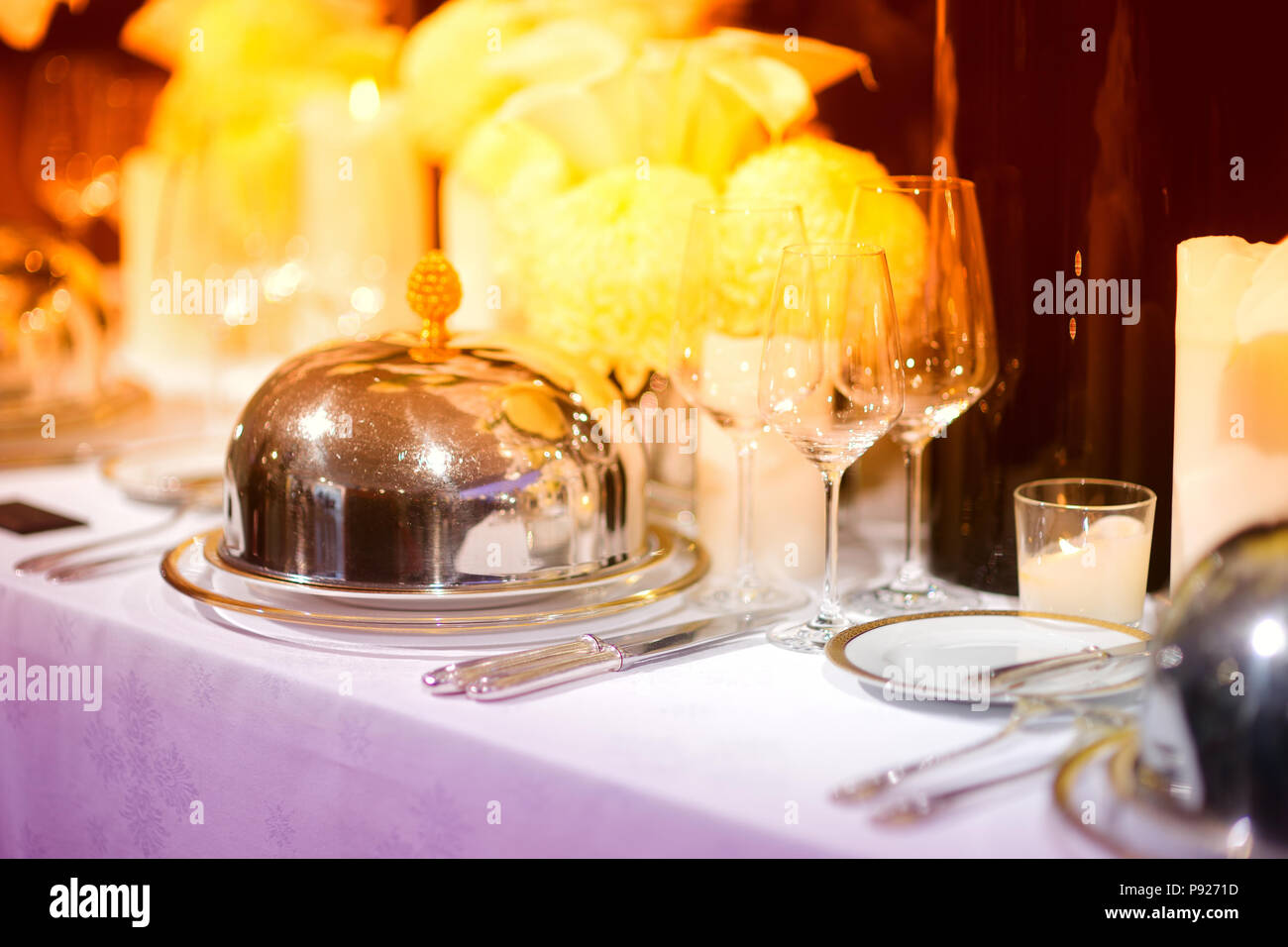 Beautiful table setting with crockery and flowers for a party, wedding ...