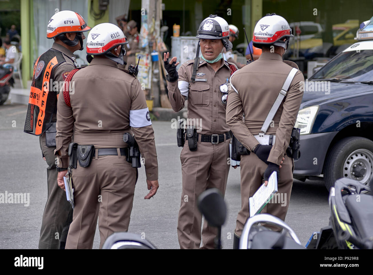 Thailand police with senior officer giving instructions Stock Photo - Alamy