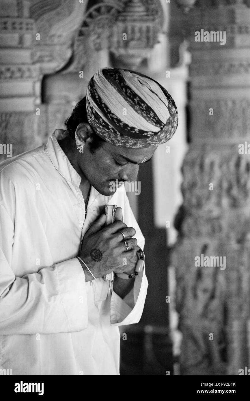 Man praying inside the golden temple Black and White Stock Photos ...