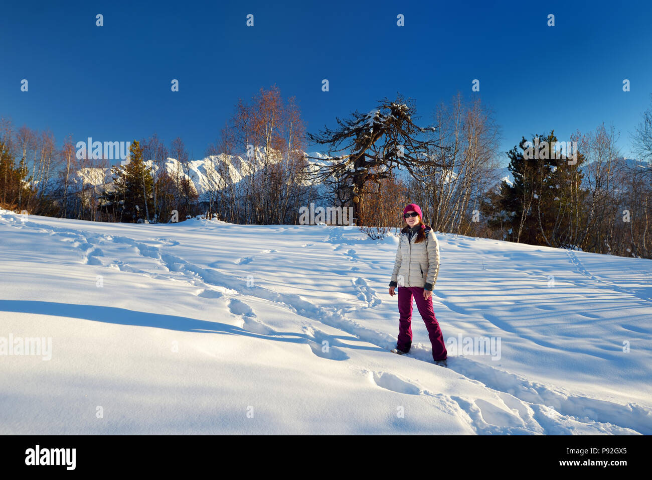 Female tourist hiking at Zuruldi mount in Hatsvali, Upper Svaneti ...