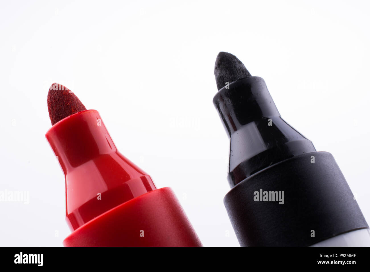 Color markers side by side on a white background Stock Photo - Alamy