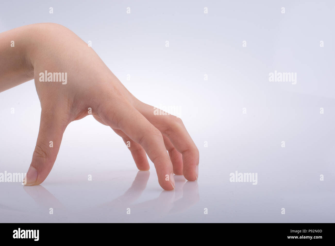 Hand holding on a white background Stock Photo - Alamy