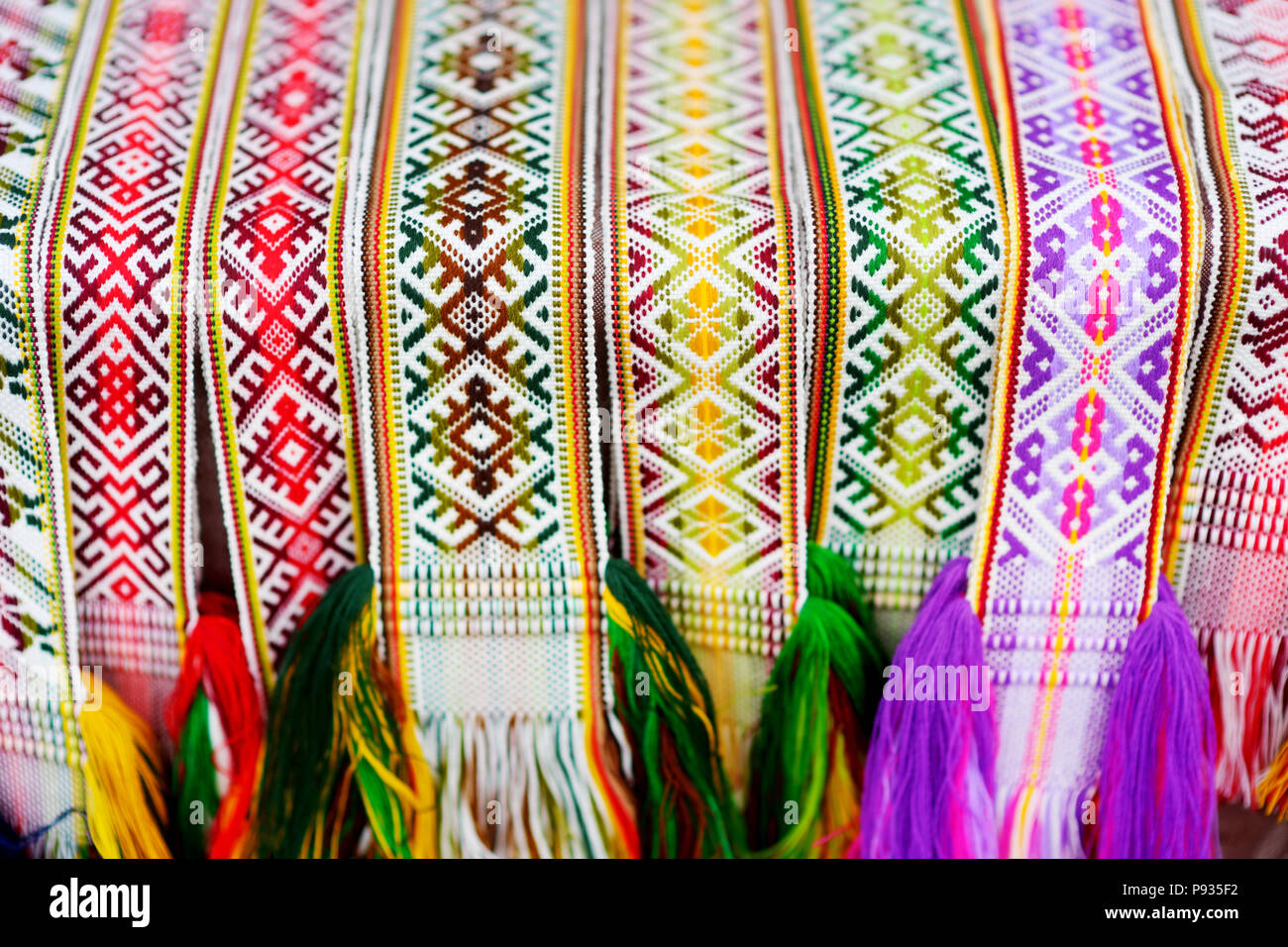 Details of a traditional colorful Lithuanian weave. Woven belts as a ...