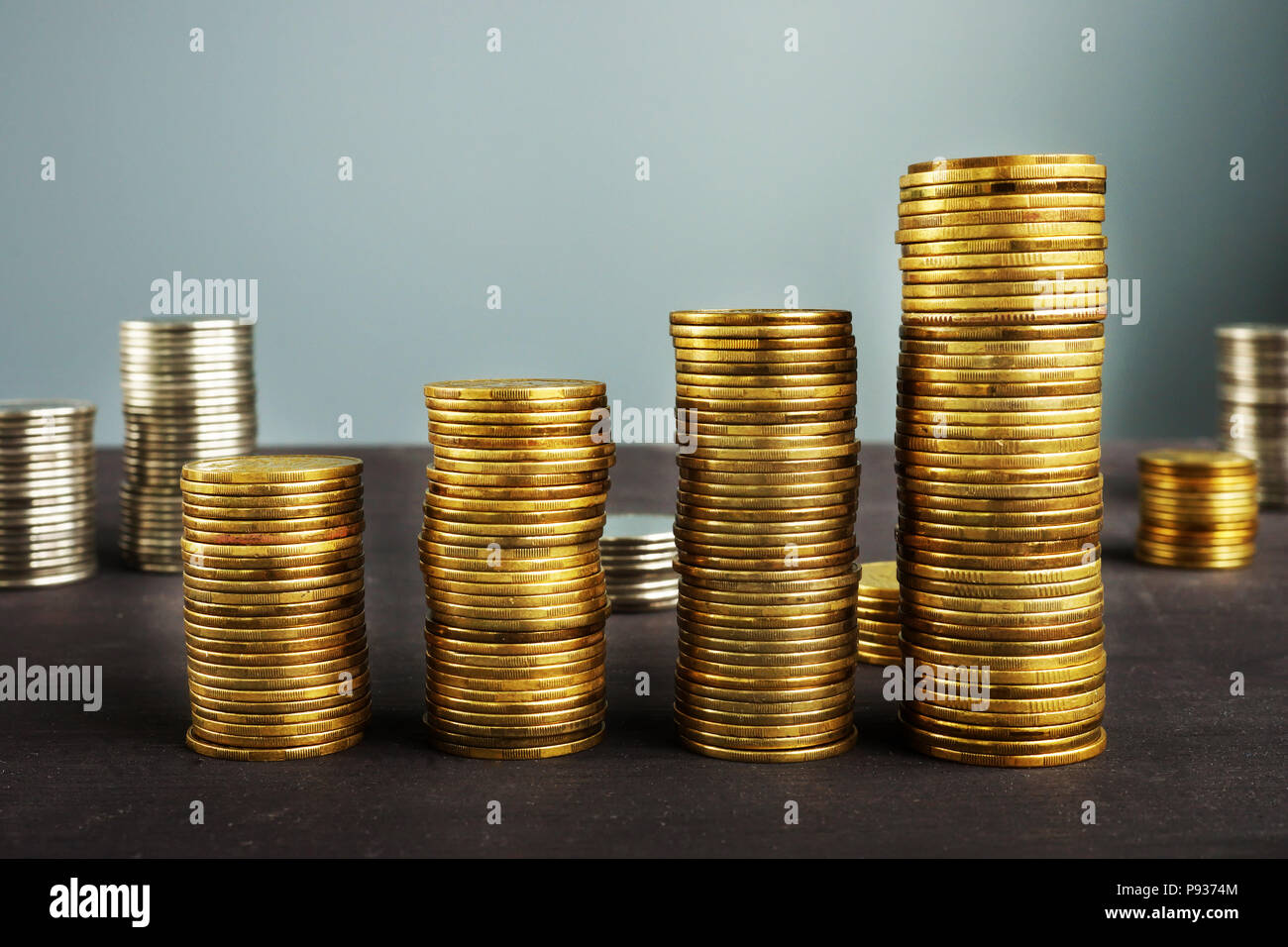Coins stack. Financial growth. Wealth management Stock Photo - Alamy