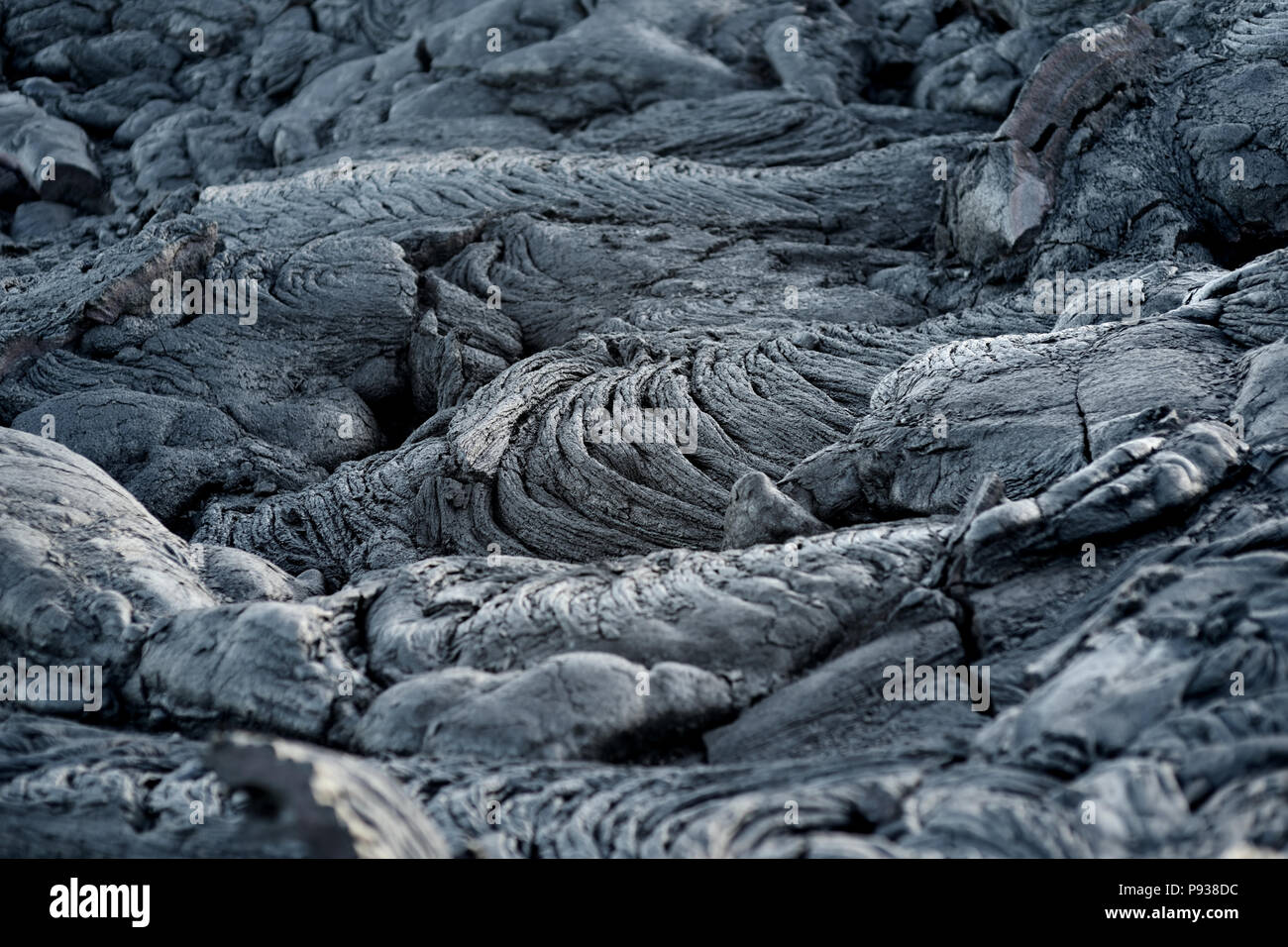 Smooth, undulating surface of frozen pahoehoe lava. Frozen lava ...