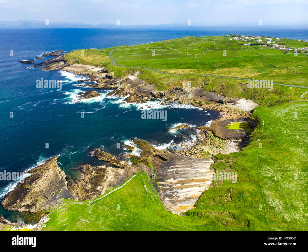 Spectacular aerial view of Mullaghmore Head with huge waves rolling ...