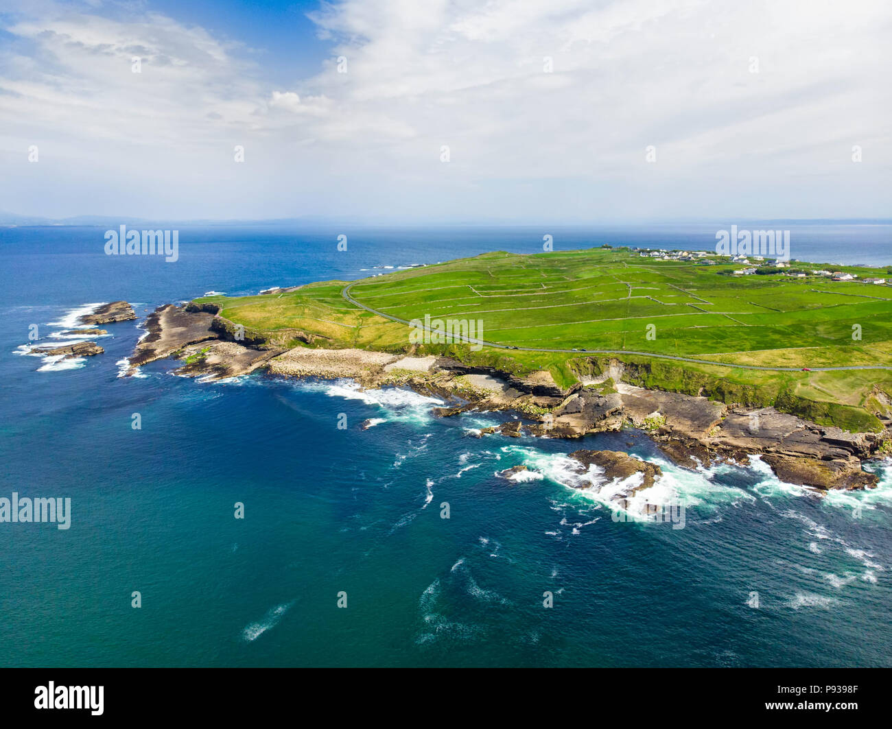Spectacular aerial view of Mullaghmore Head with huge waves rolling ...