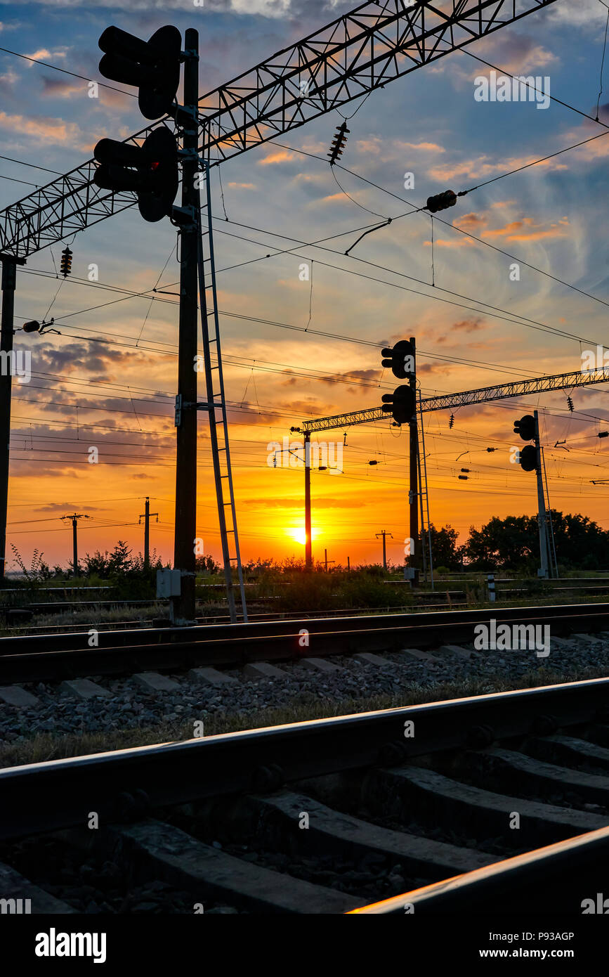 railroad infrastructure during beautiful sunset and colorful sky ...