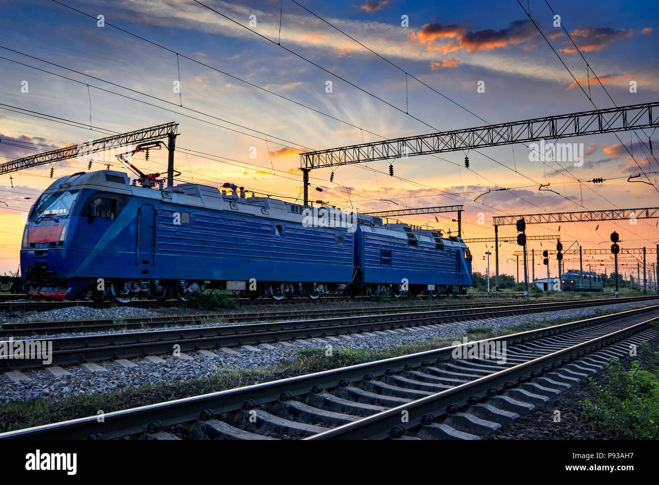 railroad infrastructure during beautiful sunset and colorful sky ...